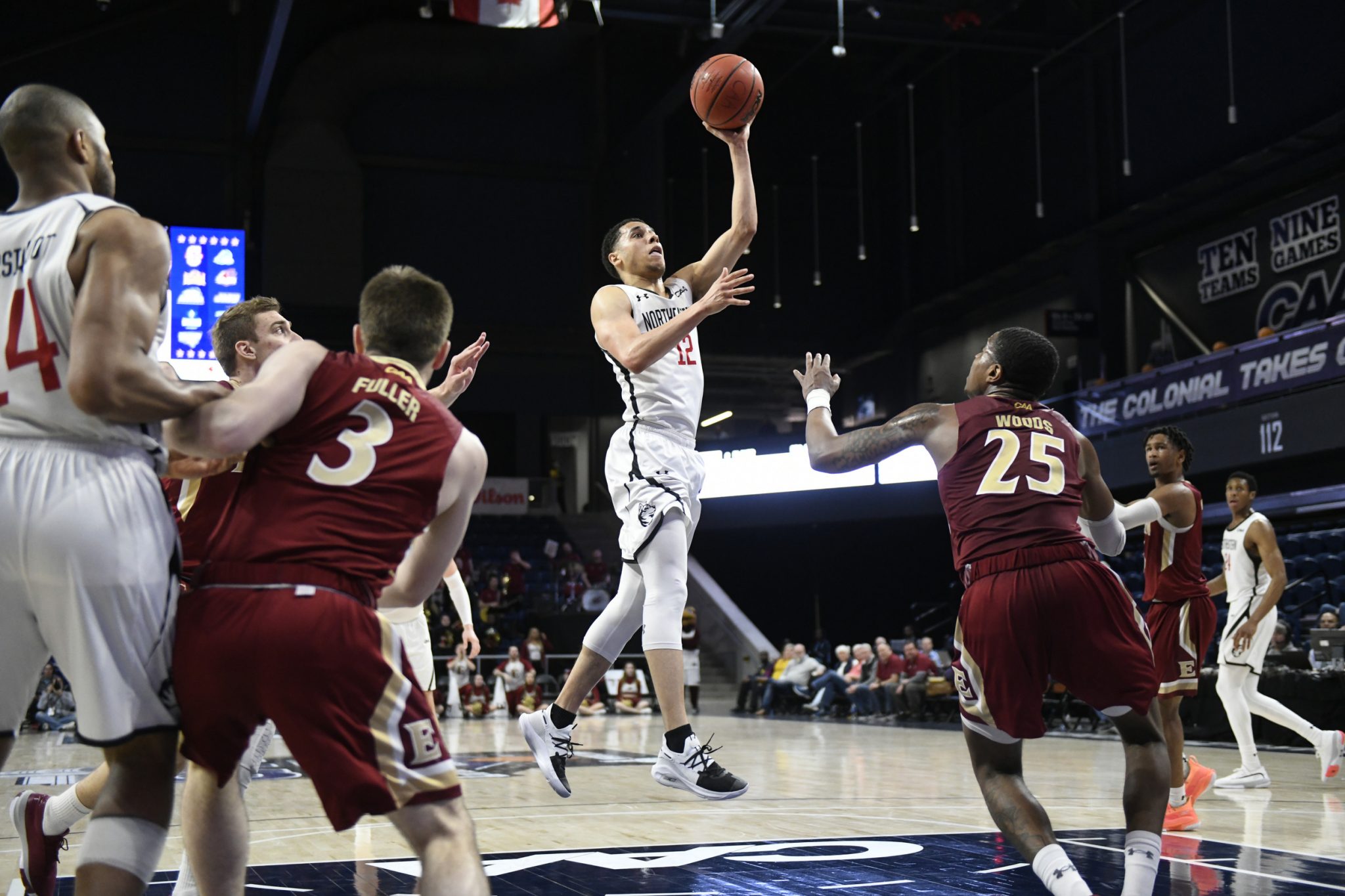Northeastern Holds Off Late Elon Rally Advances To Caa Final With 68